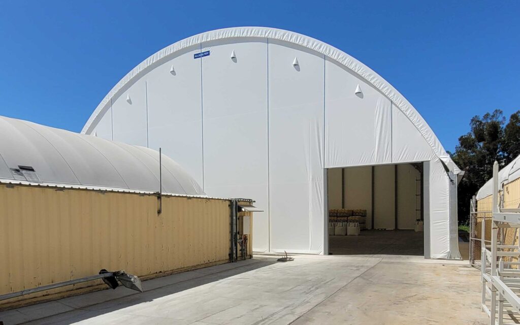 Sunstate Cement: Keeping Bulk Materials Dry - Allshelter Shelter Solution